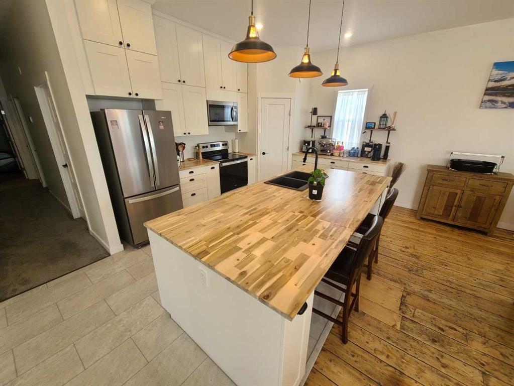 10006 100 Street - Chamberlain Real Estate Group