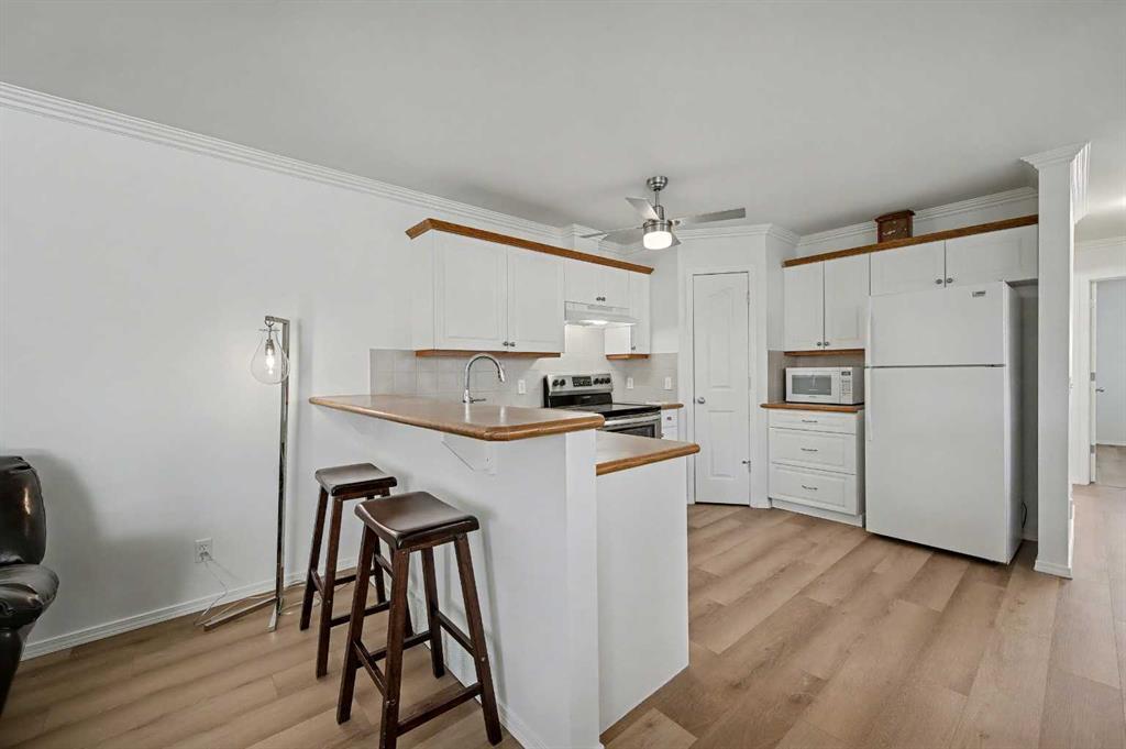 1409 Strathcona Way, Strathmore Property Listing: MLS® #A2271045