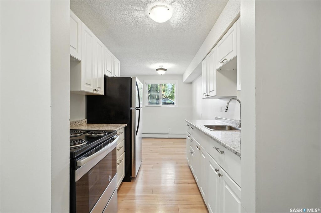 #1 - 719 10th Street E, Saskatoon Home For Sale $209,900